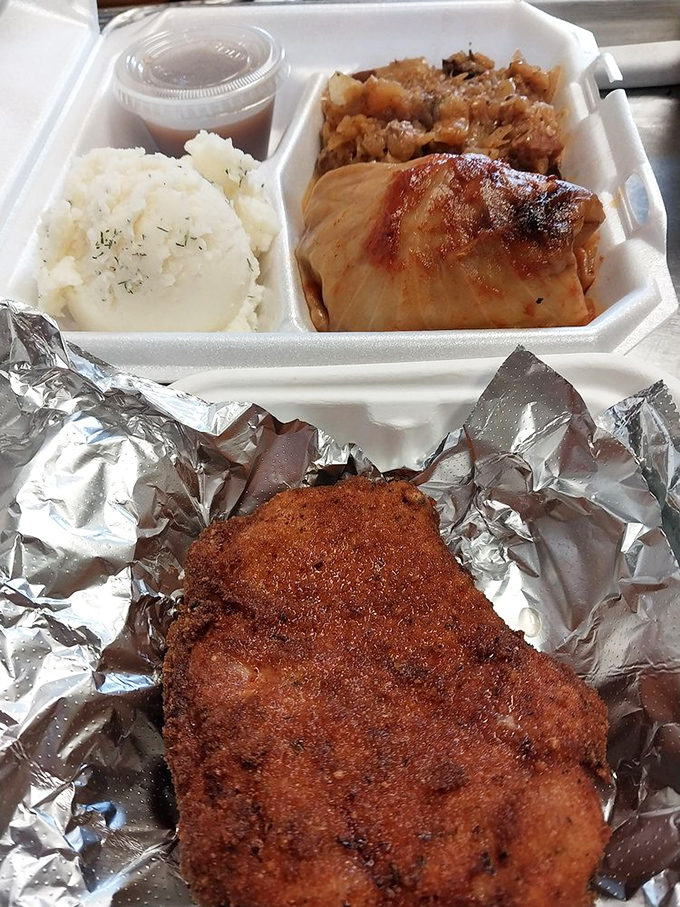 This takeout container holds more cultural heritage than most museum exhibits&mdash;kielbasa, pierogies, cabbage, and sauerkraut creating a symphony of flavors.