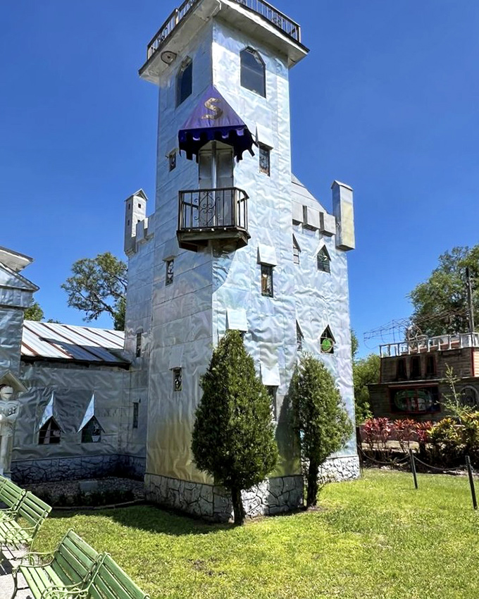 The castle's watchtower stands sentinel over the Florida scrubland, keeping a shiny eye out for approaching dragons or confused GPS users.