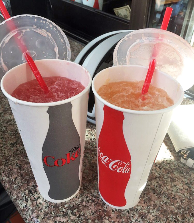 Refreshment comes in vibrant hues at La Taqueria. These agua frescas are the perfect counterpoint to the savory richness of your meal.