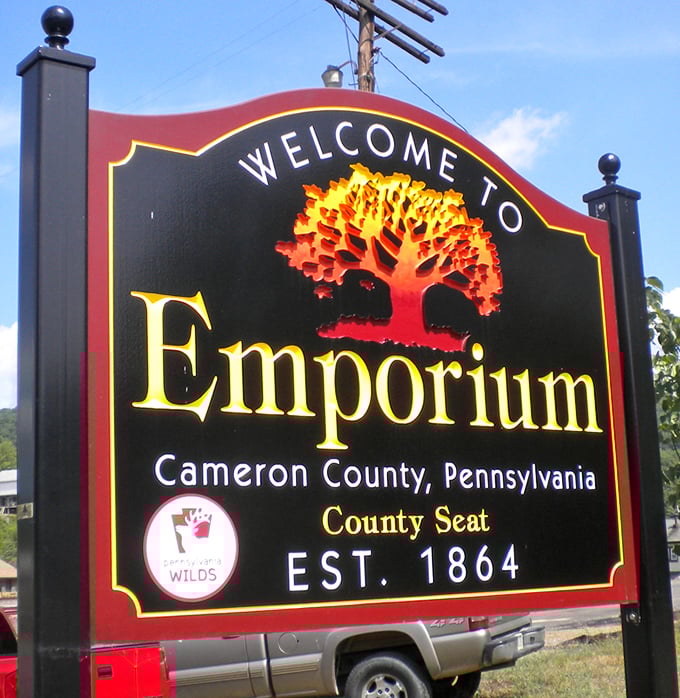 Emporium's welcome sign perfectly captures the town's essence: established 1864, but the affordable living secret is much more recent.