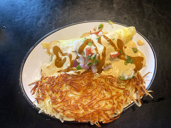 This Western omelet doesn't just sit on the plate&mdash;it commands attention with crispy hash browns playing the perfect supporting role.