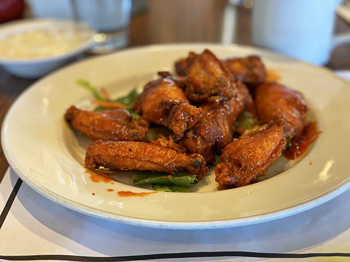 Wings that deliver the perfect trifecta: crispy exterior, juicy interior, and a sauce that makes you wonder why you ever bothered with napkins.