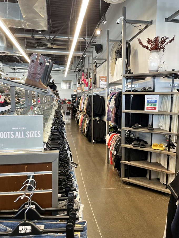 Wide aisles and thoughtful organization make browsing a joy rather than a contact sport. Note the cowboy boots standing at attention on the upper shelf!