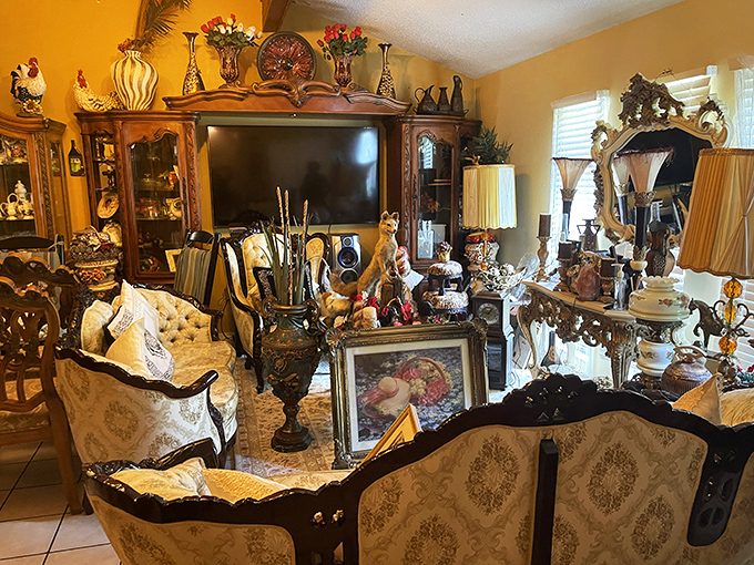 Ornate furniture and decorative pieces create a living room display that rivals any high-end furniture showroom's carefully curated arrangements.