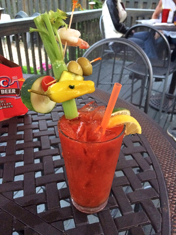 Not just a Bloody Mary, but a garden and seafood appetizer in a glass. This drink has more garnishes than my grandmother's living room has doilies.