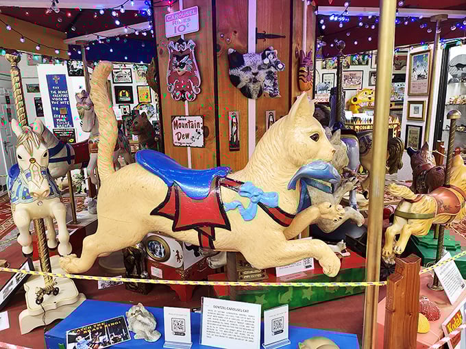 The carousel cat, painted with floral details, captures the whimsy of vintage amusement rides while honoring our feline companions.