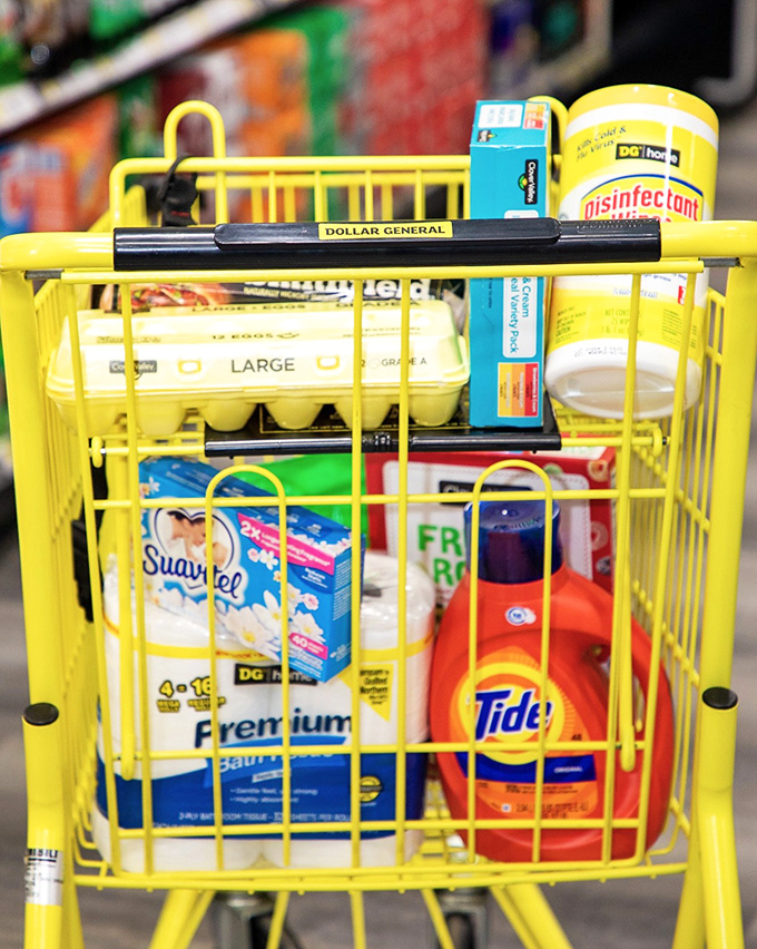 The yellow chariot of essentials! A Dollar General cart filled with life's necessities is the modern version of a hunter-gatherer's successful expedition.