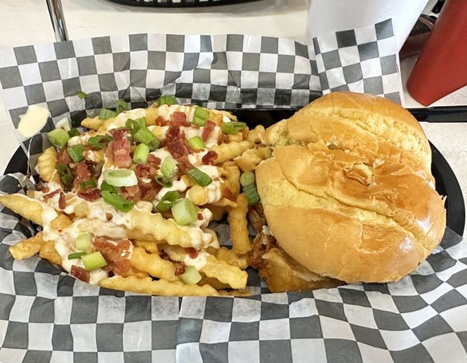 Comfort food squared: a hot chicken sandwich paired with loaded fries that could make even the most dedicated cardiologist temporarily reconsider.