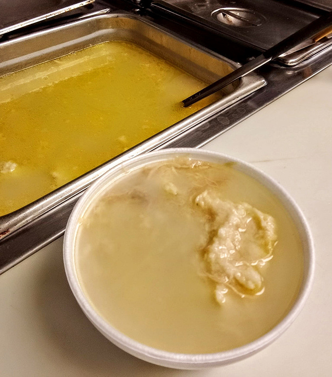 Chicken soup that could heal anything from a cold to a broken heart. Clear broth, tender chicken, and the unmistakable flavor of someone who actually cares.