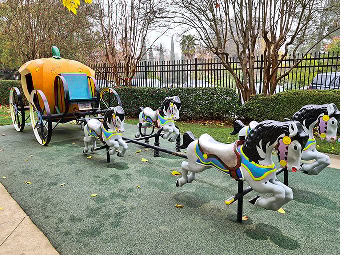 Cinderella's pumpkin coach stands ready for royal adventures, though these horses look considerably happier than the mice that got volunteered for the original transformation.