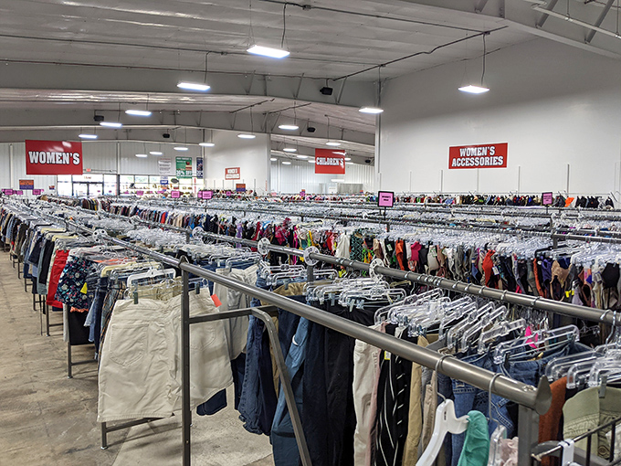 Rack after glorious rack of potential wardrobe transformations. Each hanger holds not just clothing, but someone's abandoned style story waiting to be continued.