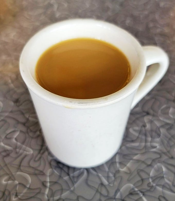 Diner coffee: not pretentious, not single-origin, just honest brew that says "good morning" like an old friend who always tells it straight.
