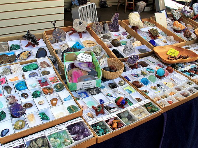 Nature's artwork sparkles in trays of crystals and gemstones, transforming this corner of the market into a geological wonderland.