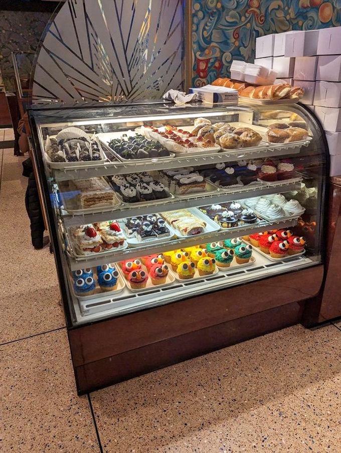 The dessert case &ndash; where willpower goes to die and happiness begins. Those colorful cupcakes are practically winking at you!