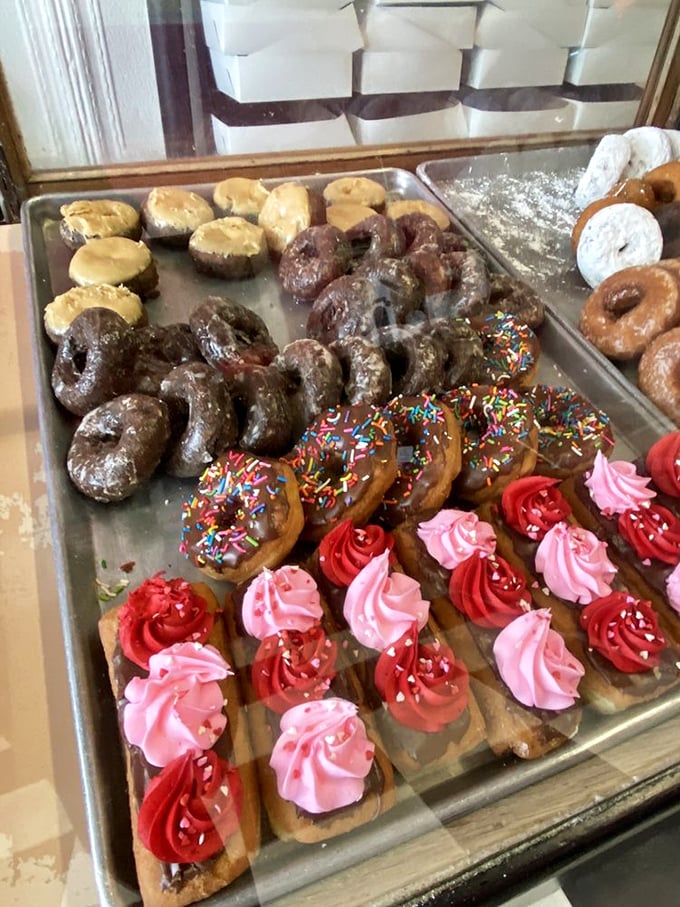 A rainbow of frosted delights awaits the indecisive sweet tooth. Life's too short not to try one of each.