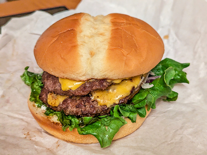 This double cheeseburger doesn't just satisfy hunger &ndash; it conquers it. Two perfectly charred patties with melted cheese create the ultimate comfort food masterpiece.