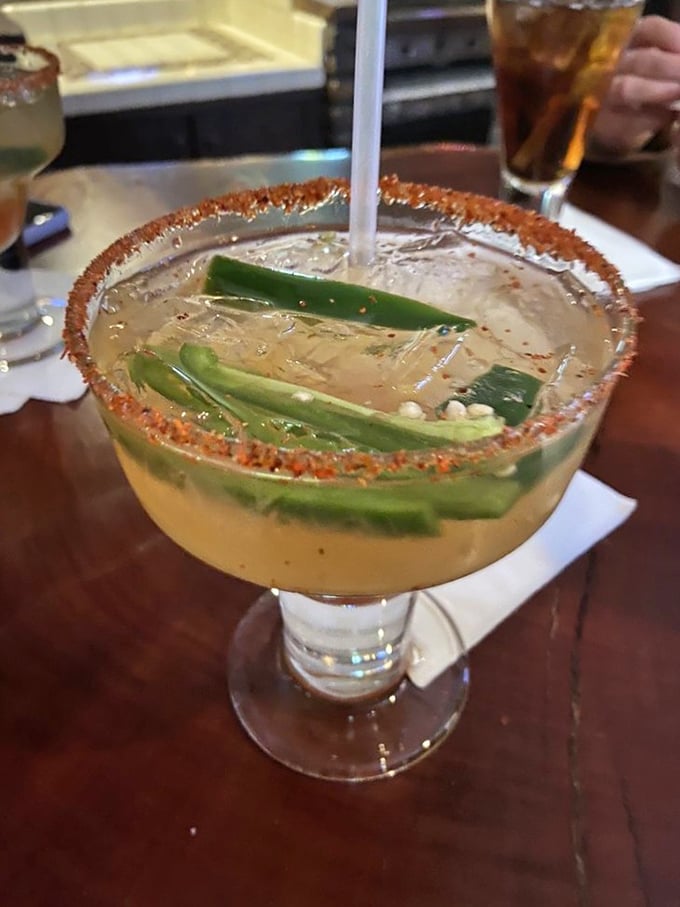 A margarita rimmed with chile-lime salt and floating jalape&ntilde;o slices&mdash;because sometimes your drink should be as adventurous as you are.