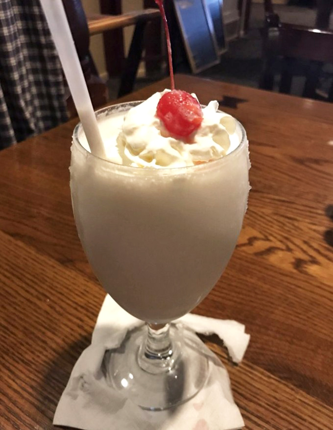 Even the milkshakes here get the royal treatment, complete with whipped cream and that perfect cherry crown.