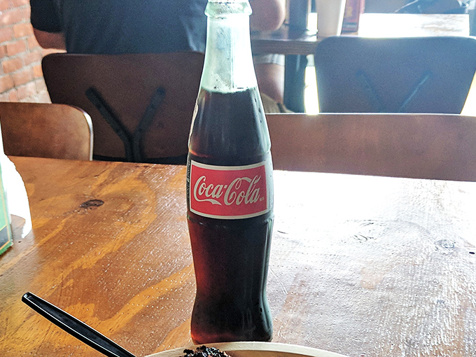 Nothing complements smoked meat quite like an ice-cold Coca-Cola in a glass bottle. Some traditions need no improvement.