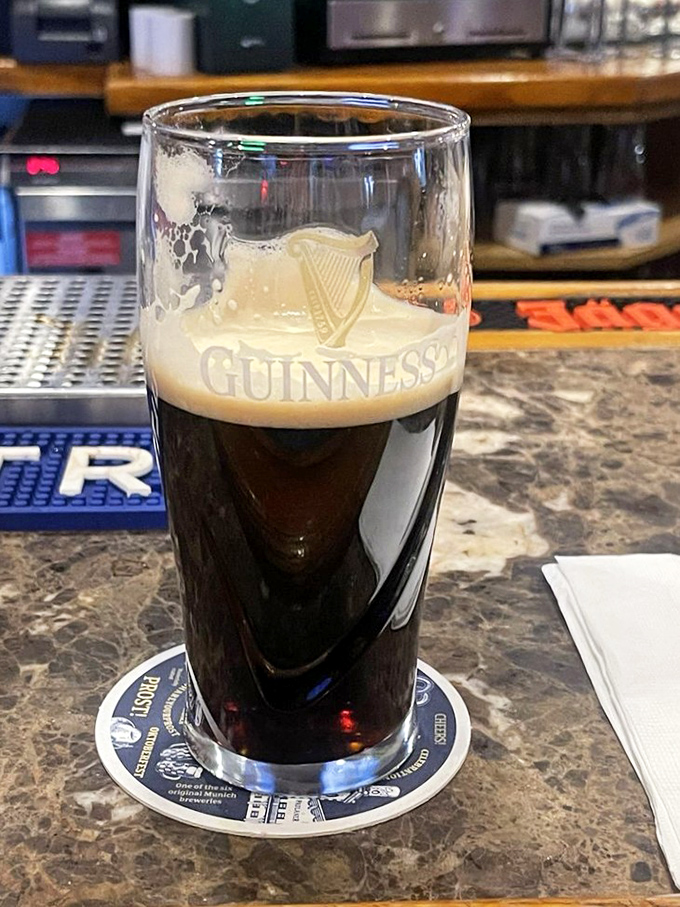 A properly poured Guinness is a work of art&mdash;dark as night with a creamy head that's worth the wait.