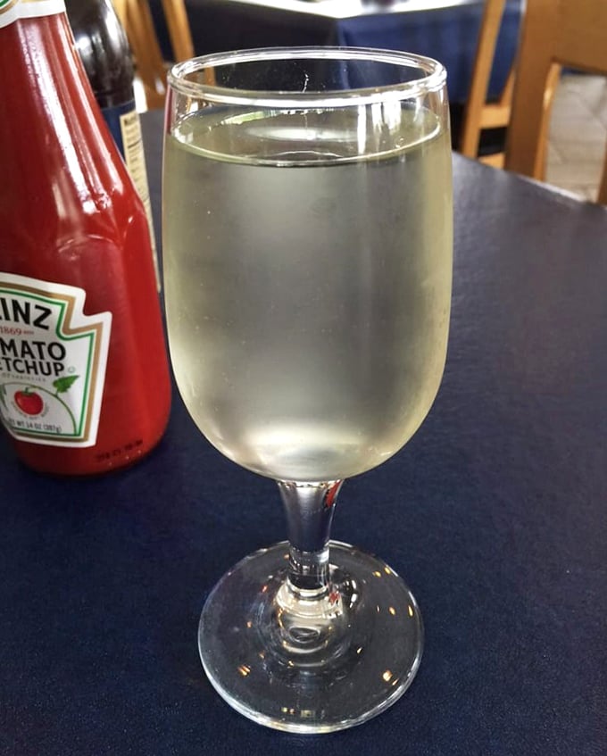 A glass of California white&mdash;because what grows together, goes together. The perfect maritime marriage of vine and brine.