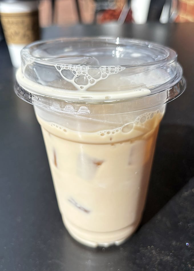 An iced coffee that looks like it could solve all of life's problems, or at least make them more bearable until lunchtime.