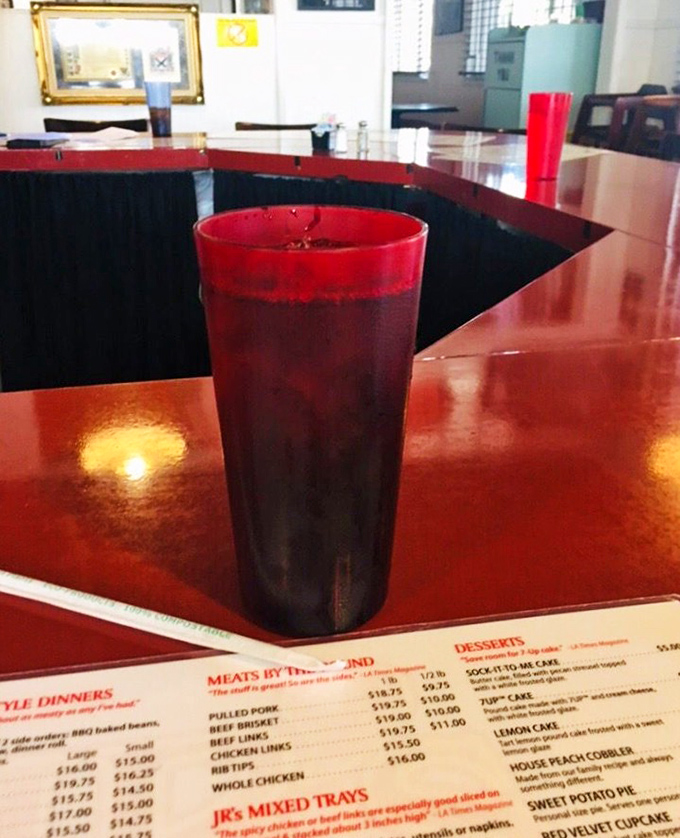 Sweet tea in a plastic cup—the unofficial champagne flute of serious barbecue establishments. Simple, unpretentious, and absolutely essential.