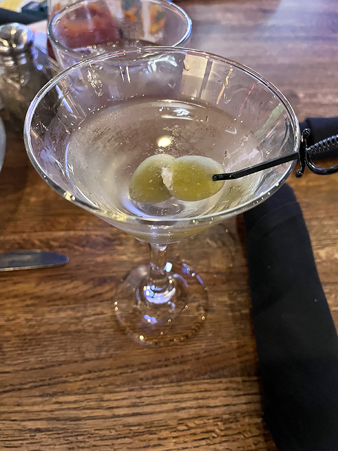 A classic martini with olives &ndash; because sometimes civilization is measured not by our technological advances, but by how well we chill vermouth.