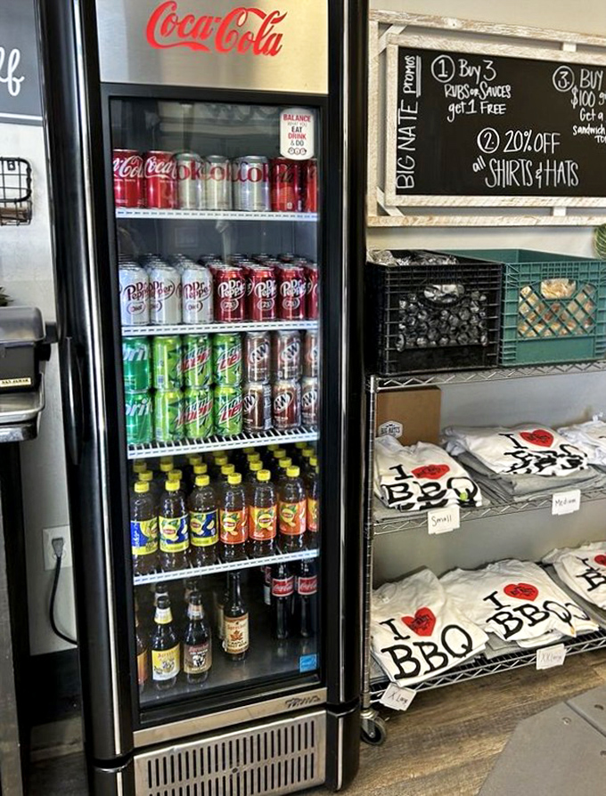 The beverage cooler and merchandise corner &ndash; because sometimes you need a cold drink and a t-shirt to commemorate your meat sweats.
