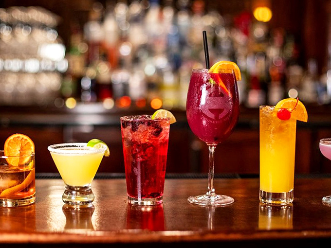 Liquid artistry lined up like the world's most delicious rainbow. These cocktails aren't just drinks&mdash;they're vacation destinations in glassware.