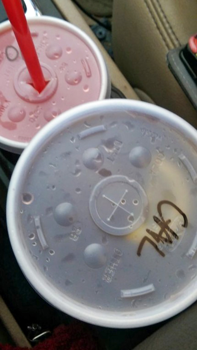 Two frosty shakes sitting in the car cupholder&mdash;one pink, one white&mdash;waiting to deliver brain freeze that's somehow worth every chilly second.