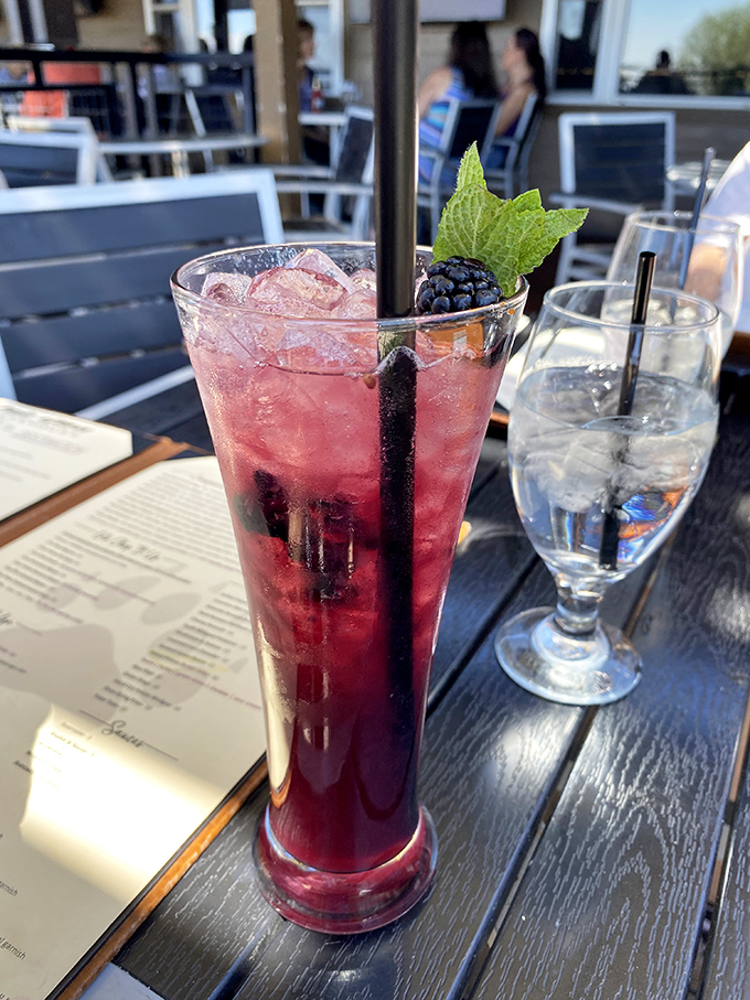 A berry-infused cocktail that's both photogenic and potent &ndash; the kind that has you planning your next visit before the glass is empty.