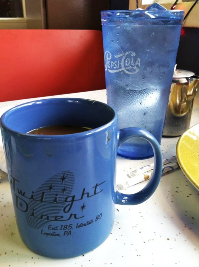 The blue mug says it all: good diners understand that coffee is both beverage and emotional support system.