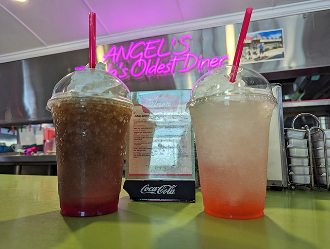 At Angel's, even the drinks come with a side of nostalgia, served in classic cups under the glow of neon that's illuminated generations of conversations.