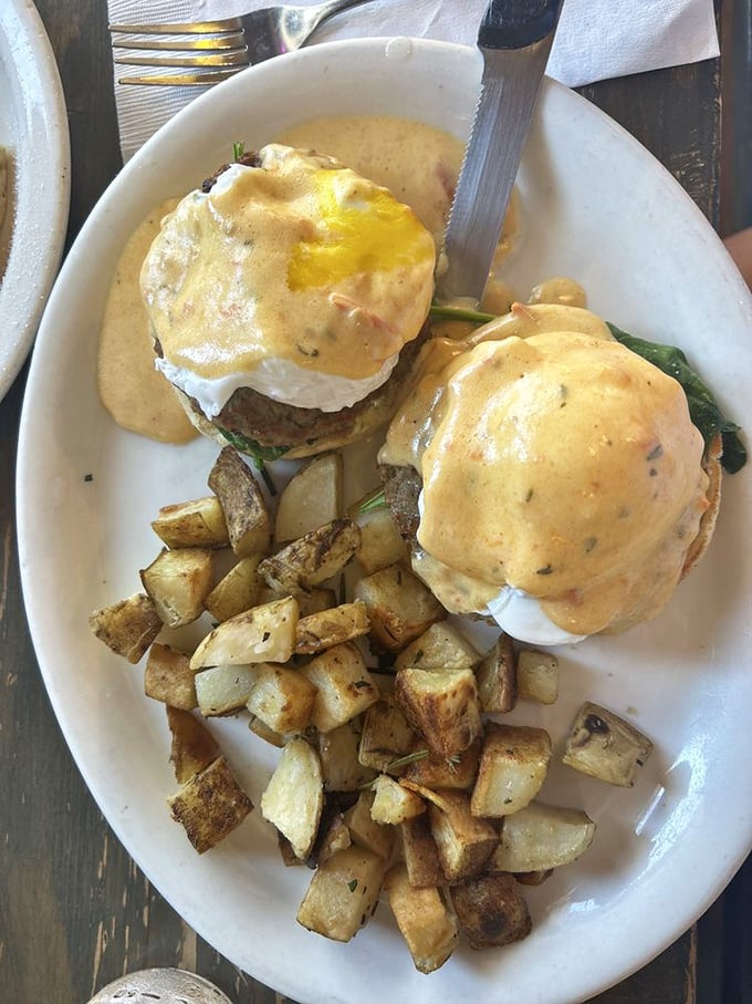 Eggs Benedict reimagined with a sauce so velvety it could win a talent show. Those home fries deserve their own fan club.