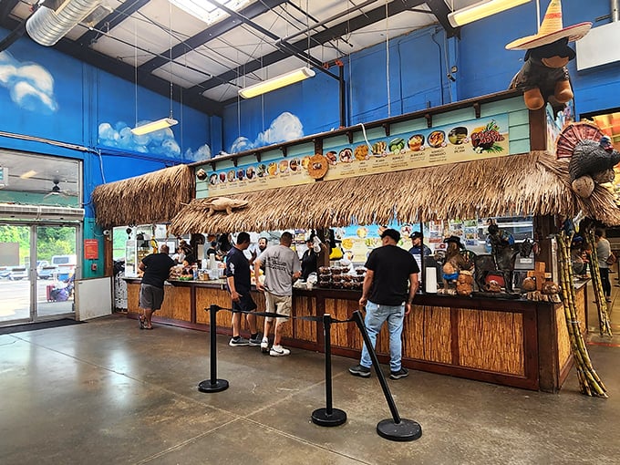 Tiki-style food counter where hunger meets its match. The straw roof isn't just decoration&mdash;it's a signal that vacation-worthy flavors await beneath.