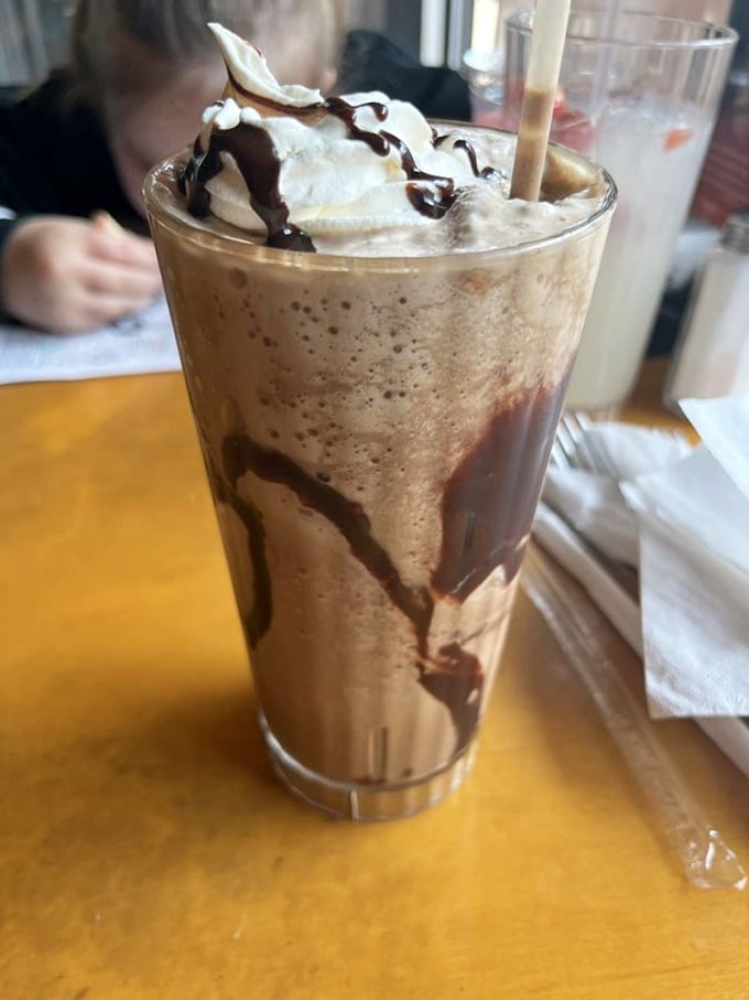 This chocolate frappe isn't just a drink, it's dessert with a straw. The whipped cream mountain on top? Just showing off.
