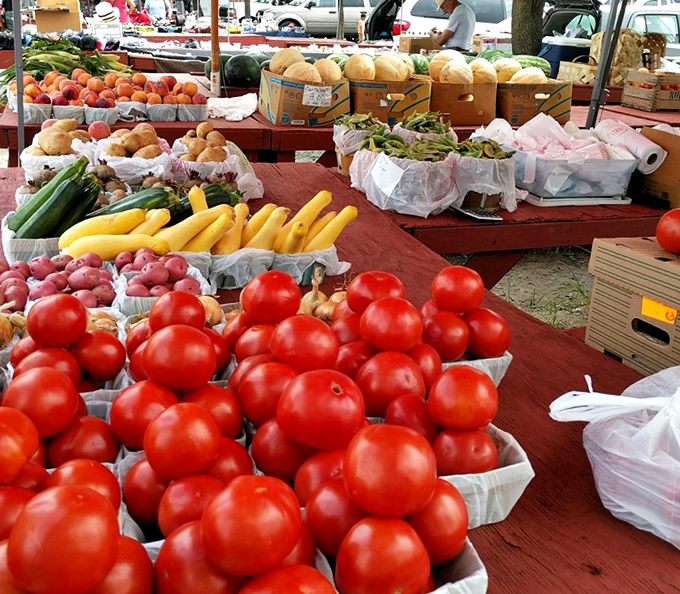 Summer's bounty sprawls across sun-warmed tables&mdash;these tomatoes haven't spent a week in cold storage wondering what they did to deserve such treatment.