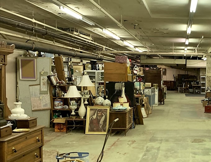 Furniture that was built when "lifetime warranty" actually meant something. That curved glass cabinet has probably outlived three families already.