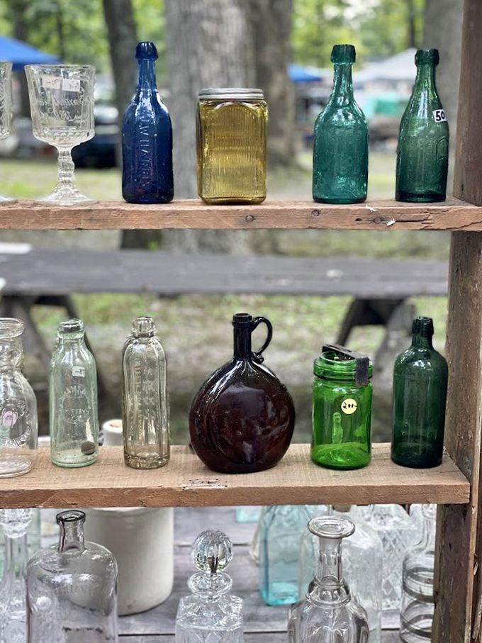 Sunlight playing through colored glass creates a symphony of hues. Each bottle holds memories of celebrations long forgotten.