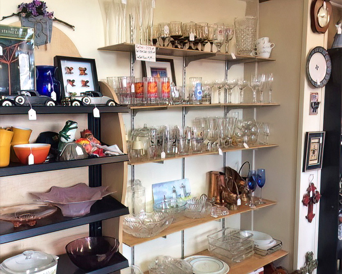 Crystal catches light while vintage glassware stands at attention &ndash; these aren't just drinking vessels, they're conversation pieces with pedigrees.