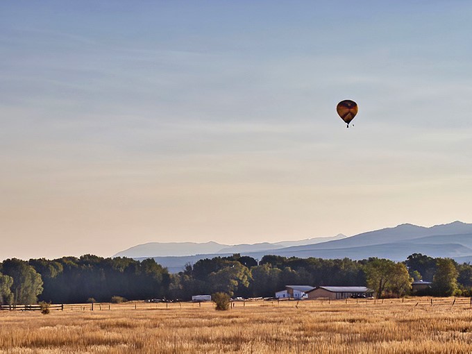 Hot air ballooning over Teton Valley &ndash; where social distancing was cool long before it was mandatory. Golden fields below, endless blue above, and silence that speaks volumes.