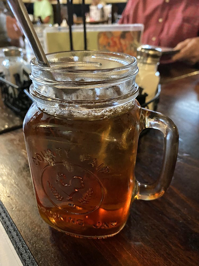 Iced tea served in a mason jar—because sometimes the vessel matters as much as what's inside it. Simple pleasures, perfectly executed.