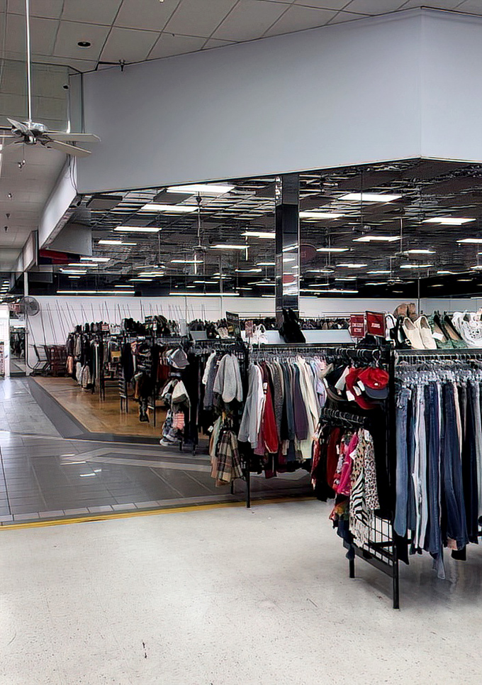 The clothing section stretches toward the horizon like a textile ocean, promising fashion treasures for the persistent explorer.