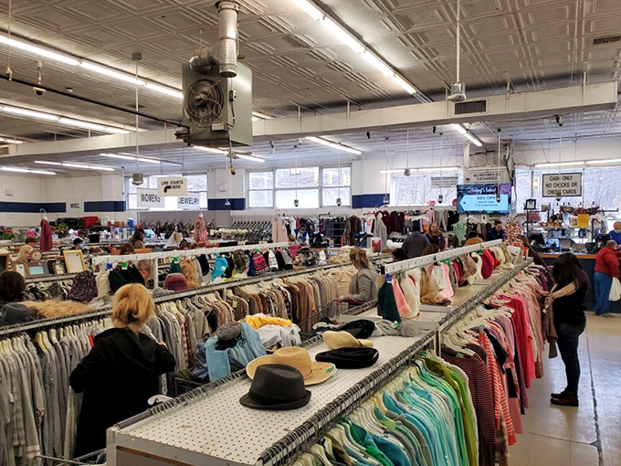 Shoppers navigate the well-organized aisles like seasoned explorers, each on their own quest for secondhand gold.