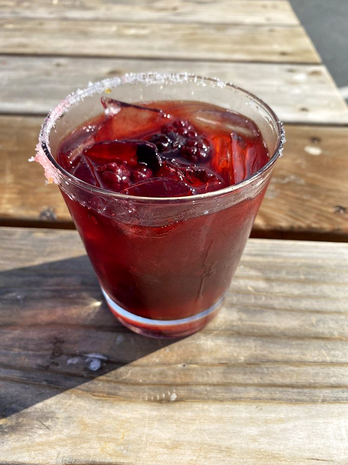 This margarita's deep red hue suggests serious berry business &ndash; the kind that makes coastal drives even more magical.
