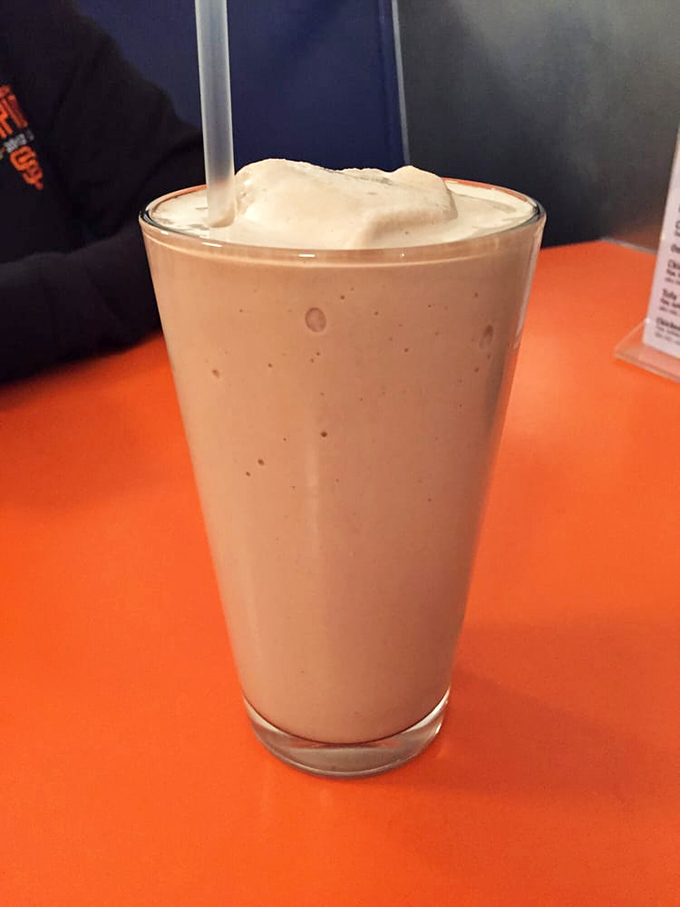 This isn't just a milkshake&mdash;it's a frothy commitment to happiness. Thick enough to require serious straw strength but worth every bit of effort.