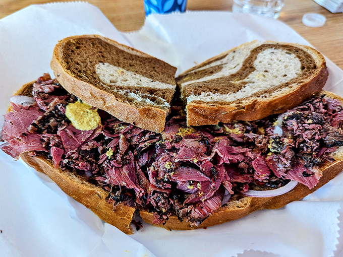 Pastrami piled so high you'll need to unhinge your jaw like a python. The marbled rye bread is merely playing a supporting role in this meaty masterpiece.