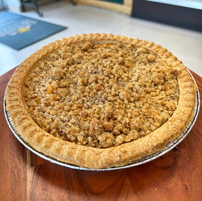 This crumb-topped masterpiece isn't just a pie &ndash; it's an architectural achievement with a PhD in comfort food. The golden crust deserves its own Nobel Prize.