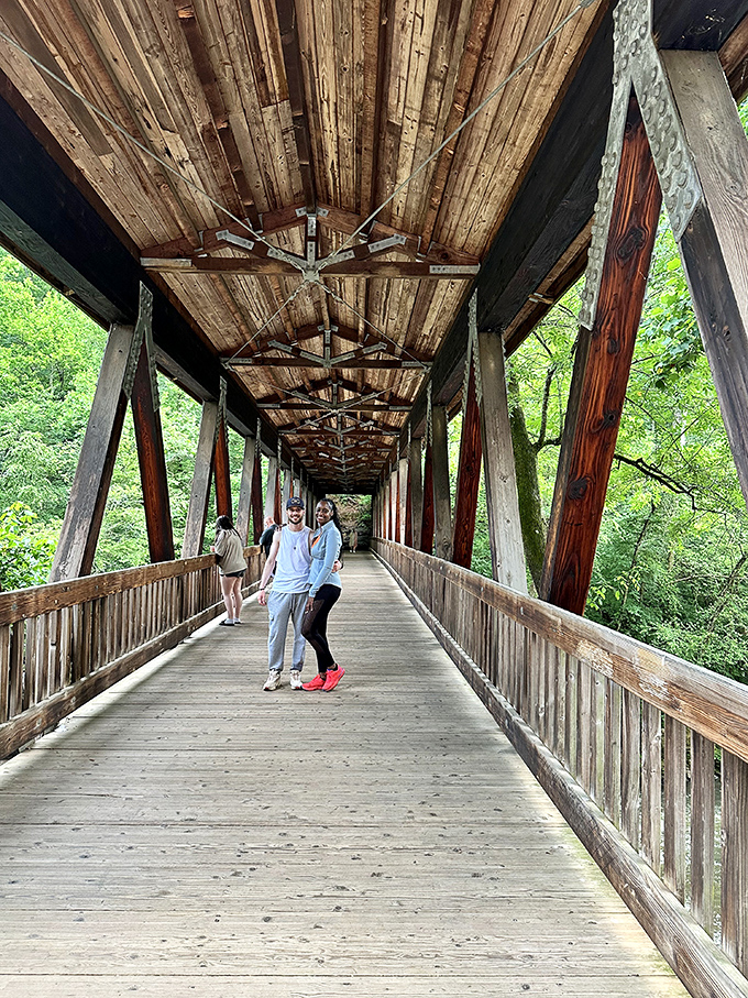 This covered bridge doesn't just connect two shores &ndash; it connects generations. Like a wooden time machine with excellent Instagram potential.